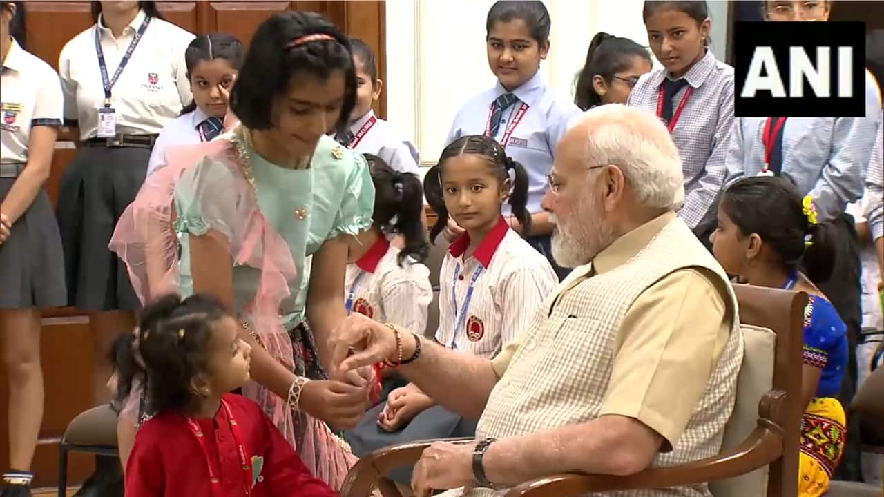 PM Modi celebrates Raksha Bandhan with schoolgirls; See pics ...