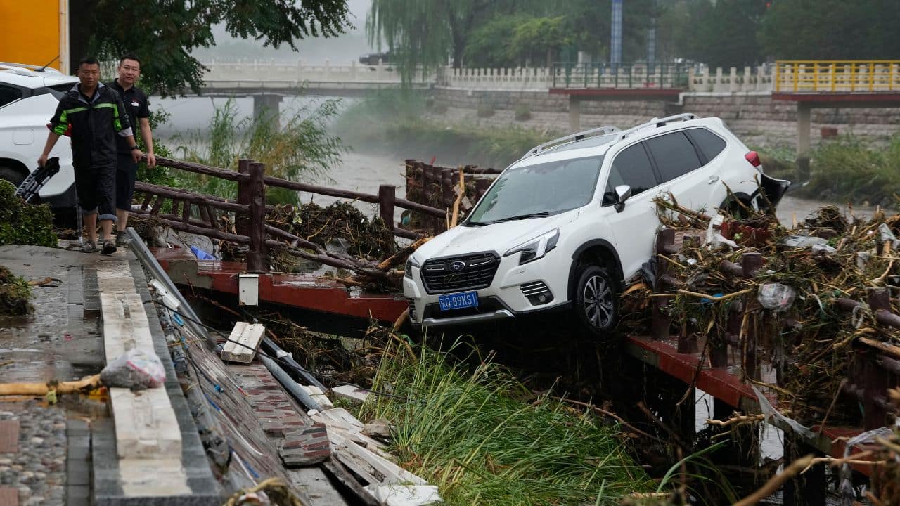 In Pics: 20 dead, 27 missing in Beijing floods, thousands evacuated