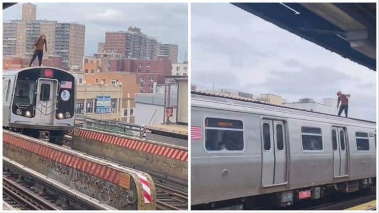 Man stands on top of moving train in New York. Viral video