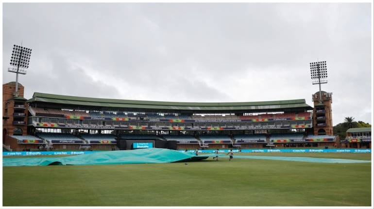 India score 180/7 before rain stops play with three balls to spare