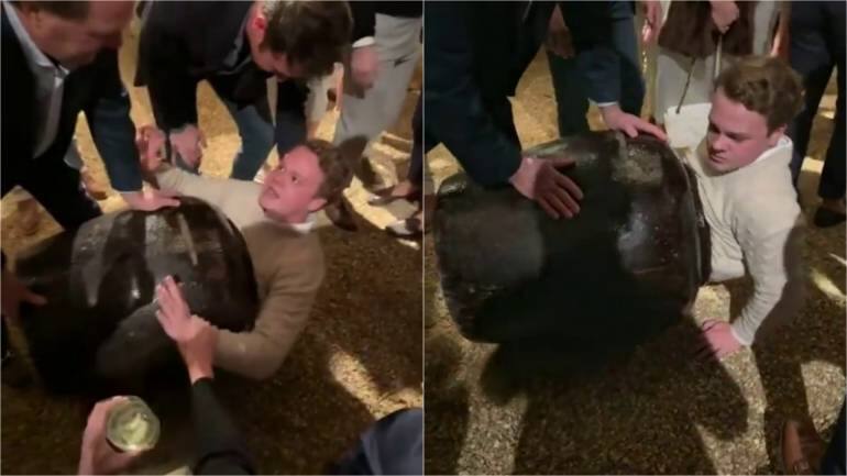 Man gets stuck in vase during party as friends erupt in laughter. Viral ...