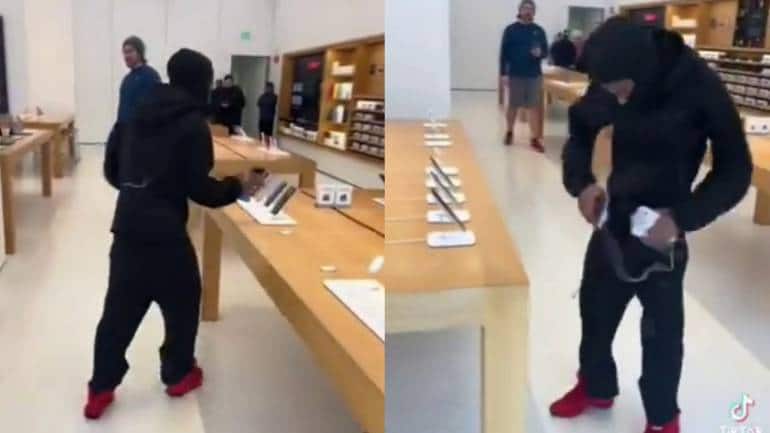 Man filmed stealing over 40 iPhones from Apple store in brazen robbery ...