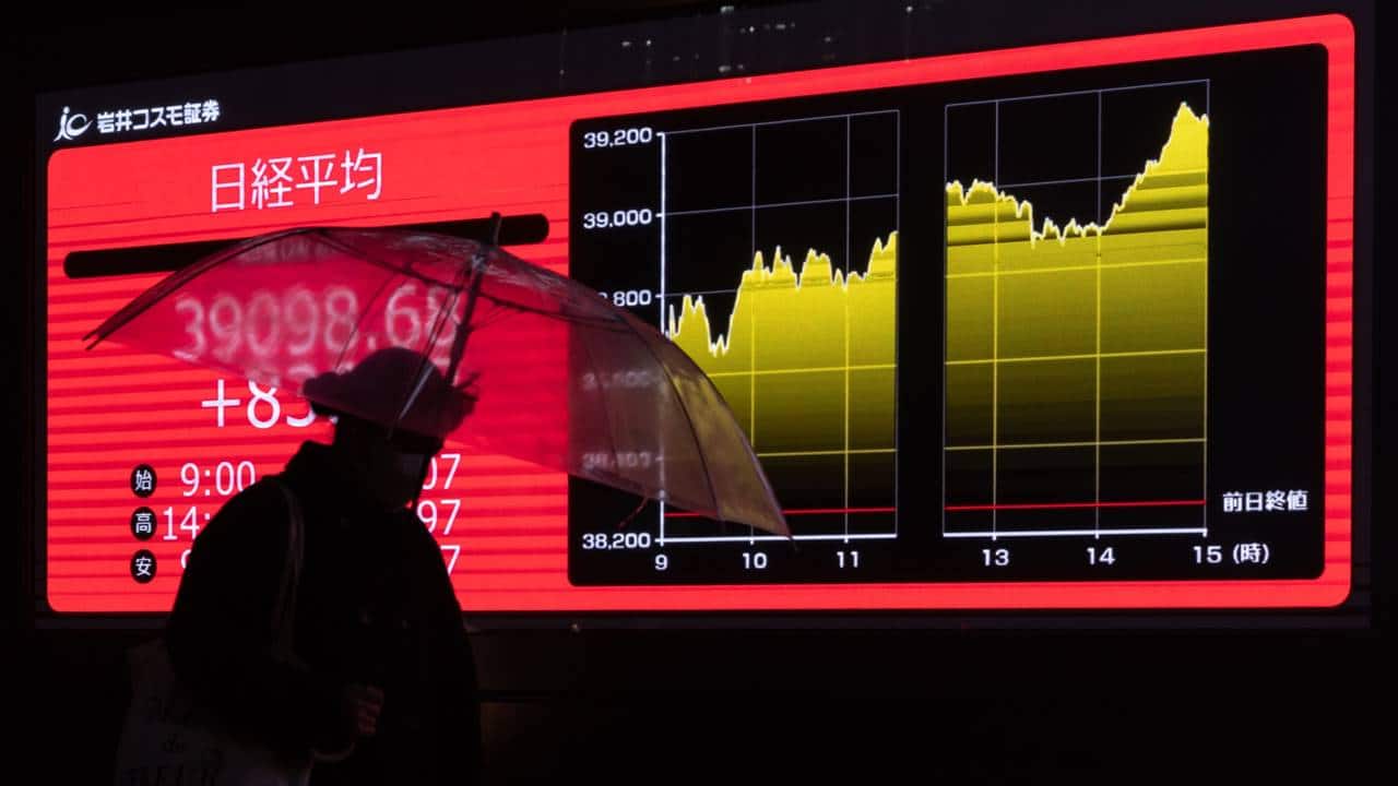 Japan's Nikkei dips below key 38,000-mark; Toyota drops