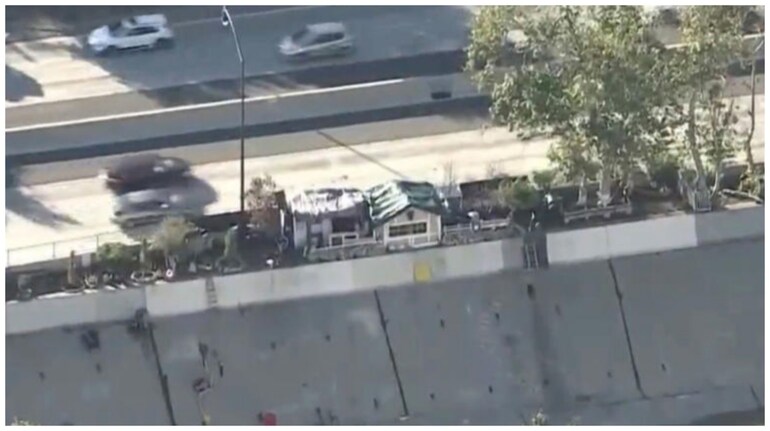 Homeless build makeshift home on US freeway. It has a garden ...