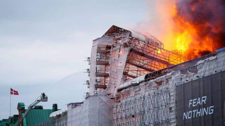 Copenhagen stock exchange fire: Spire collapses as historic Borsen ...
