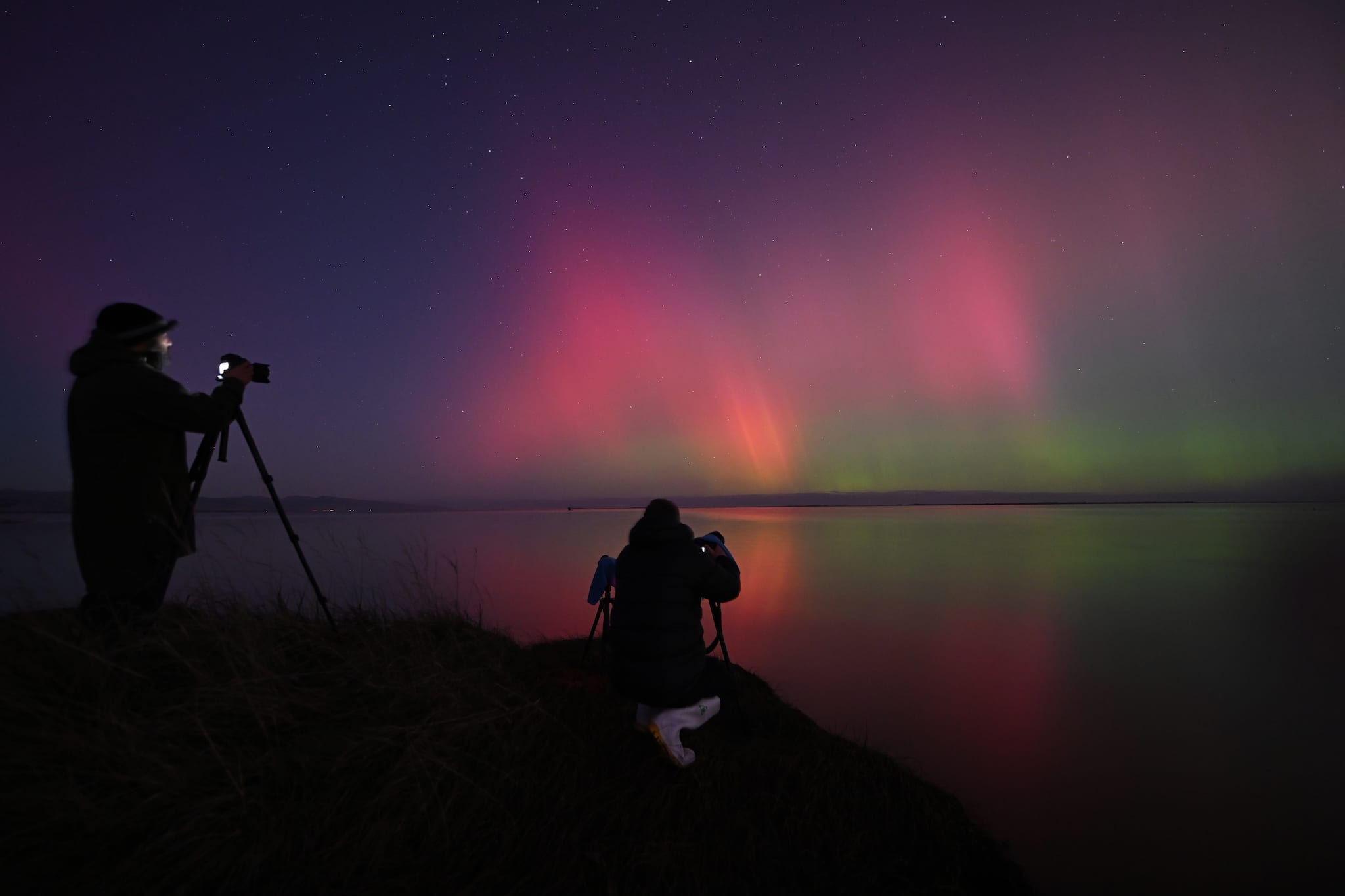 Rare solar storm lights up skies from Tasmania to Britain | See pics of ...
