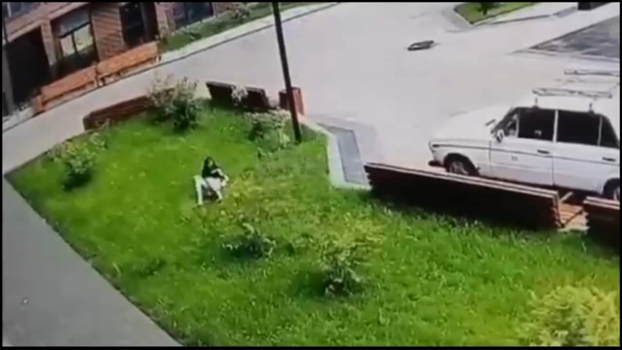 Video: Russian woman falls from 13th floor on soft grass, walks away ...