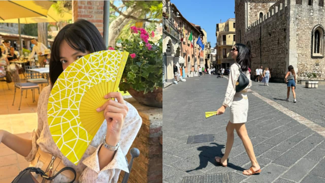 BLACKPINK's Lisa stuns with a diamond-studded custom fan during her ...