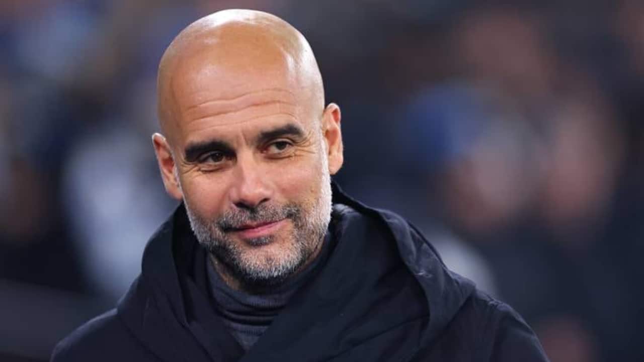 Pep Guardiola signs a 2-year contract extension at Manchester City and ...