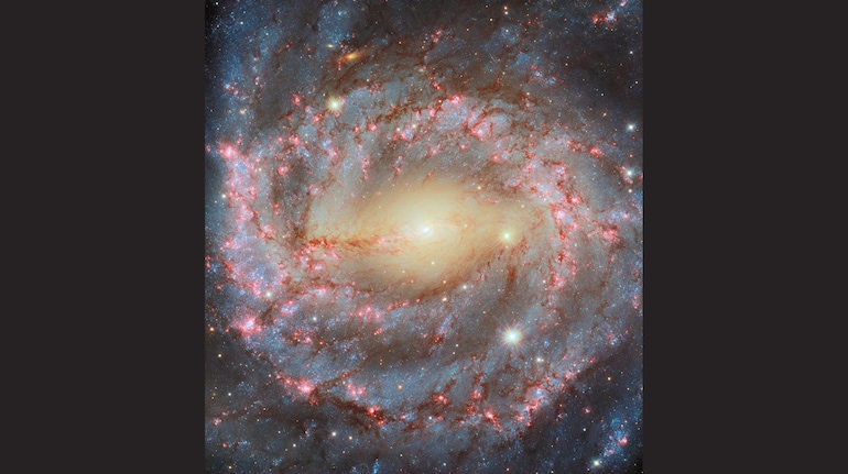 NASA’s Hubble Telescope captures a stunning grand spiral galaxy