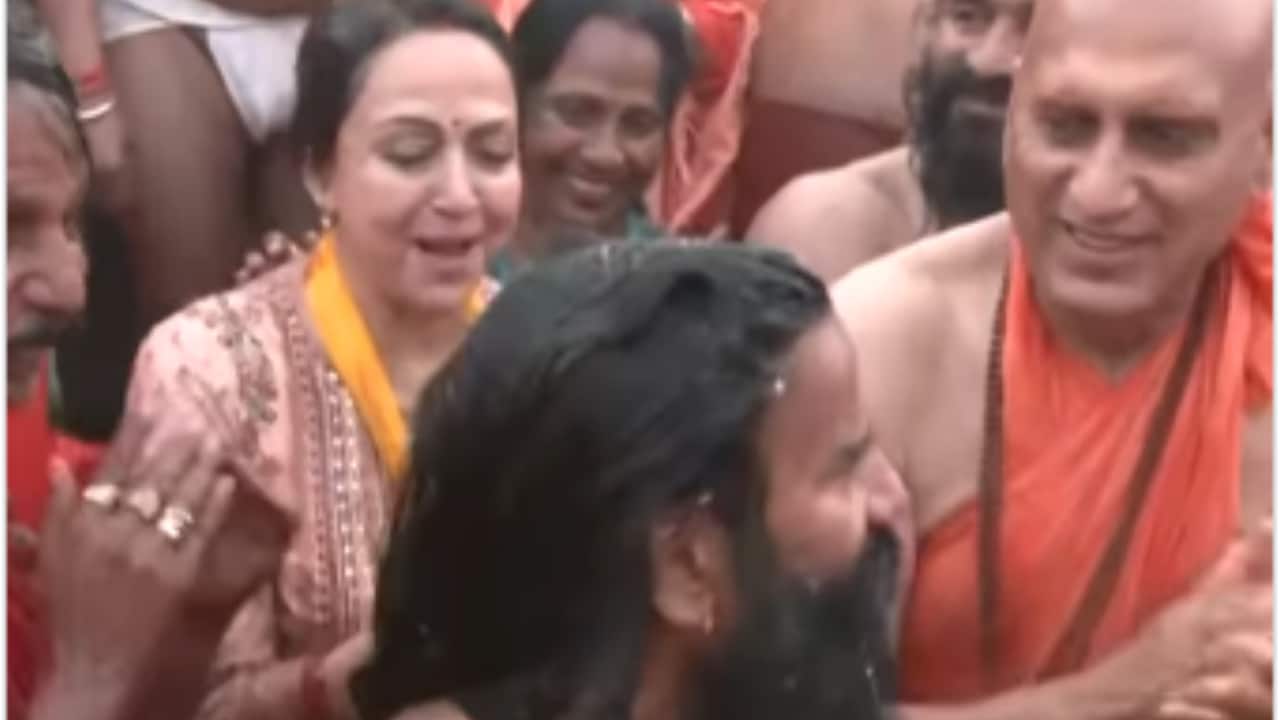 Hema Malini laughs as Baba Ramdev’s hair flip goes wrong at Maha Kumbh
