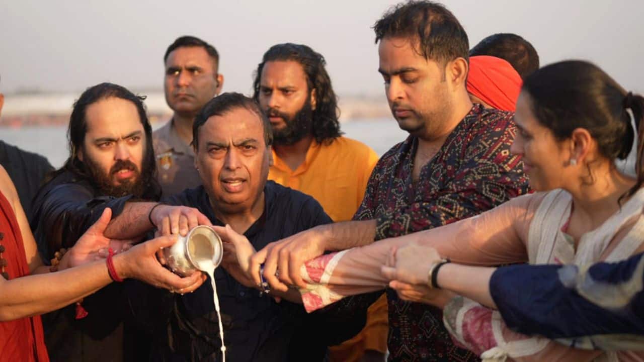 Mukesh Ambani and family take holy dip at Sangam in Maha Kumbh Mela