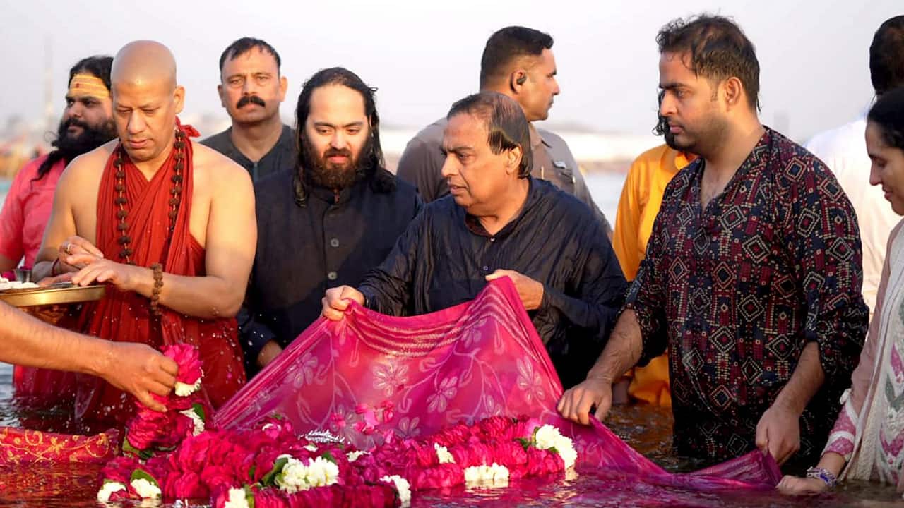Mukesh Ambani and family take holy dip at Sangam in Maha Kumbh Mela