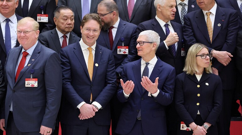 China promotes business potential to Apple, Pfizer and other US companies