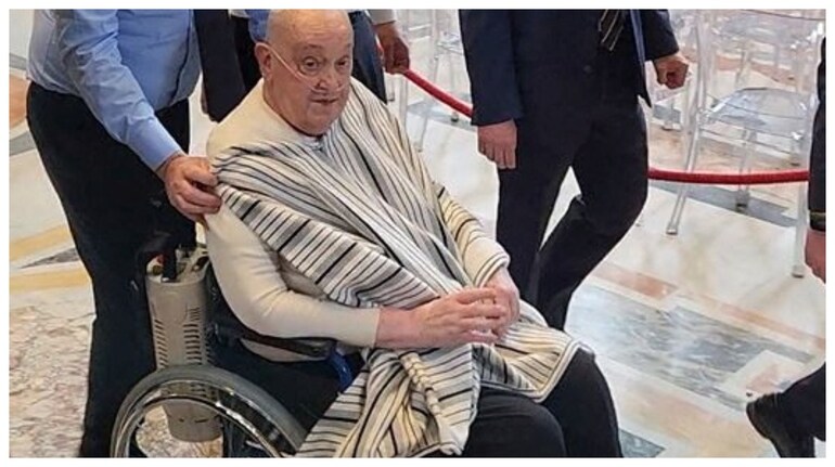 Pope Francis wears black pants, not papal attire, in surprise visit to ...
