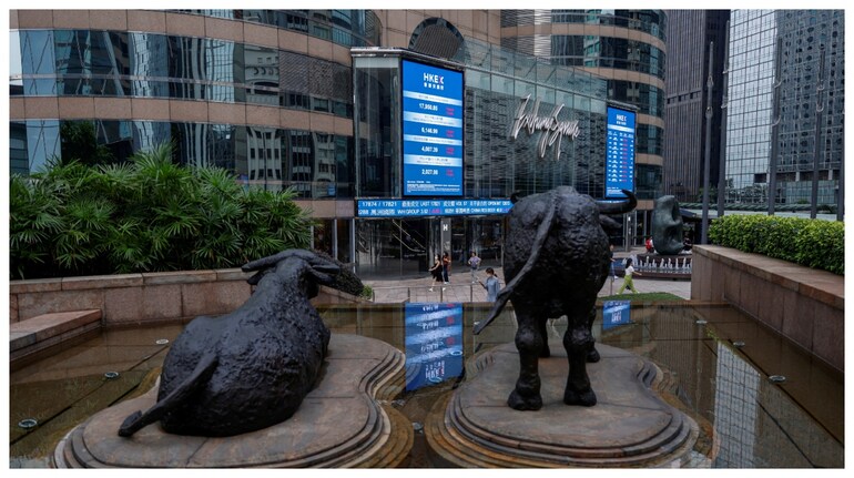 Hong Kong shares surge ahead of mainland China under economic ...