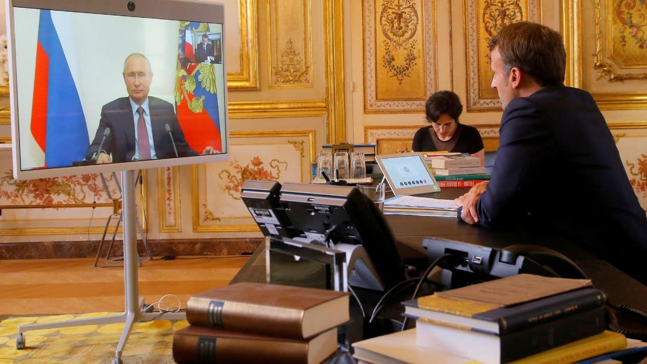 Putin, Macron discuss Iran, Ukraine in first phone call in nearly three ...