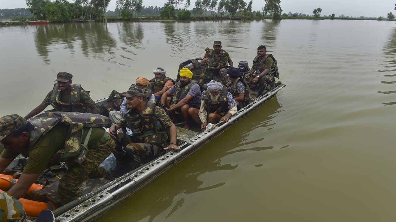 Punjab floods: Over 1,000 villages, affected; state minister blames ...