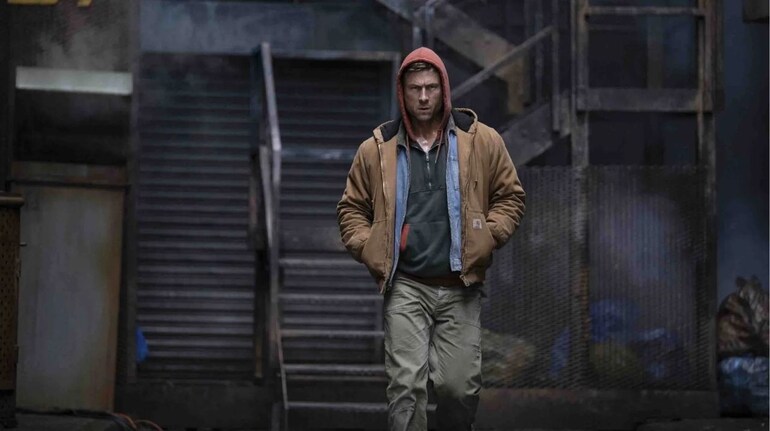 The Running Man Movie Review: Glen Powell powers a futuristic thriller ...