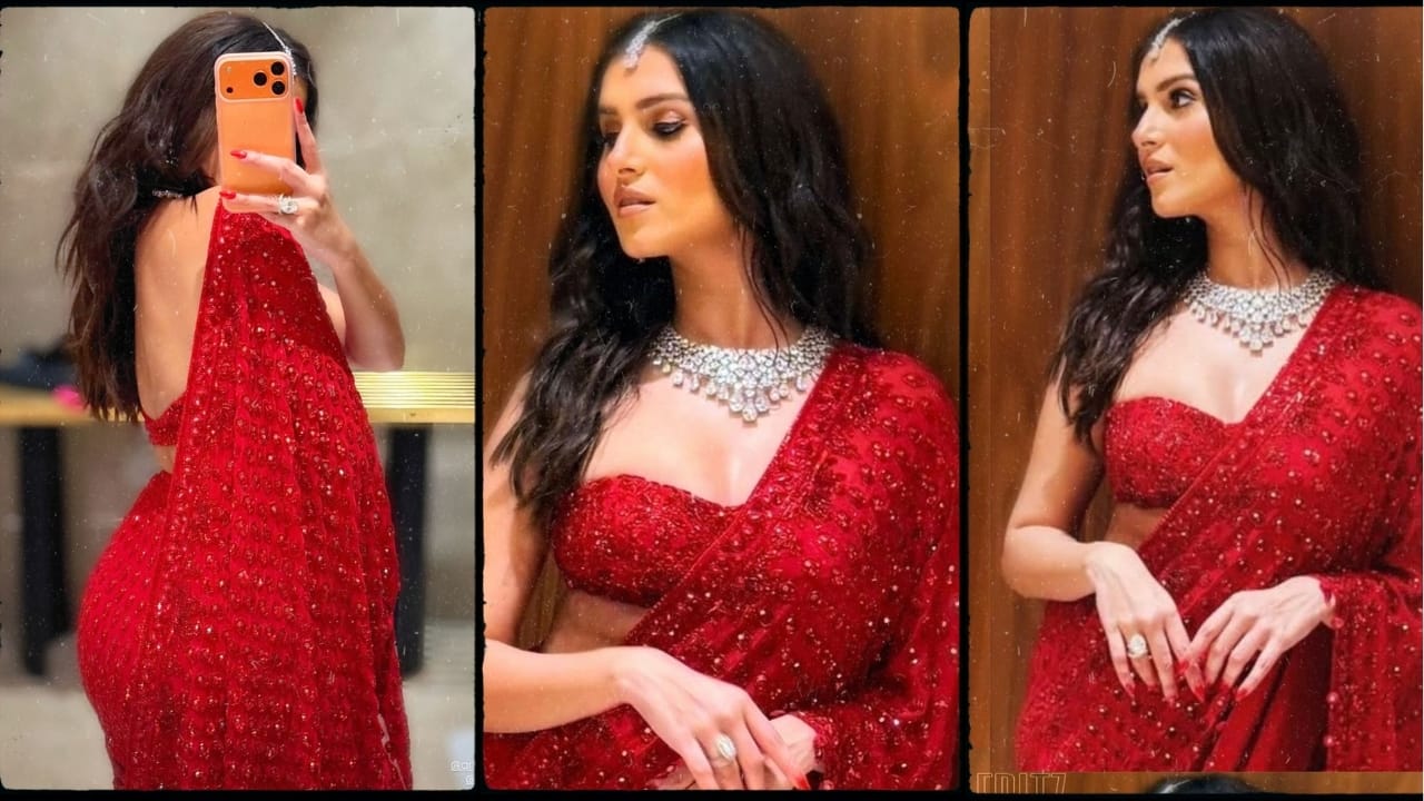 Tara Sutaria slays in a red mirror work saree and matching strapless bouse