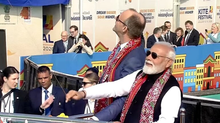 PM Modi, German Chancellor fly kite depicting Lord Hanuman at Sabarmati ...