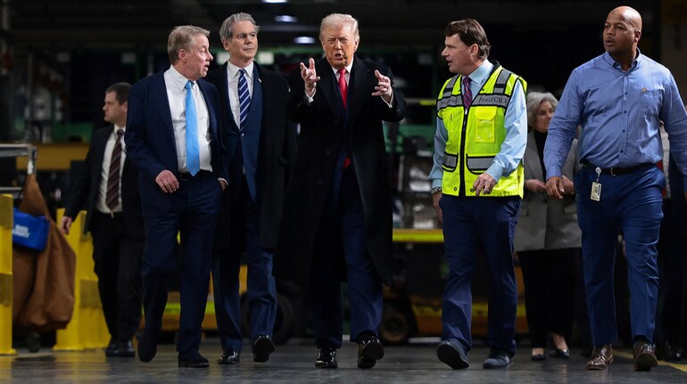 Ford suspends worker who heckled Trump during Michigan plant visit