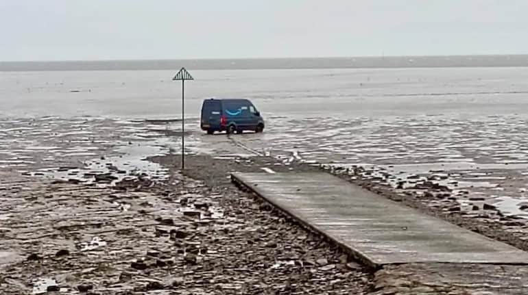 Amazon delivery van stranded on tidal mud flats after GPS sends driver ...