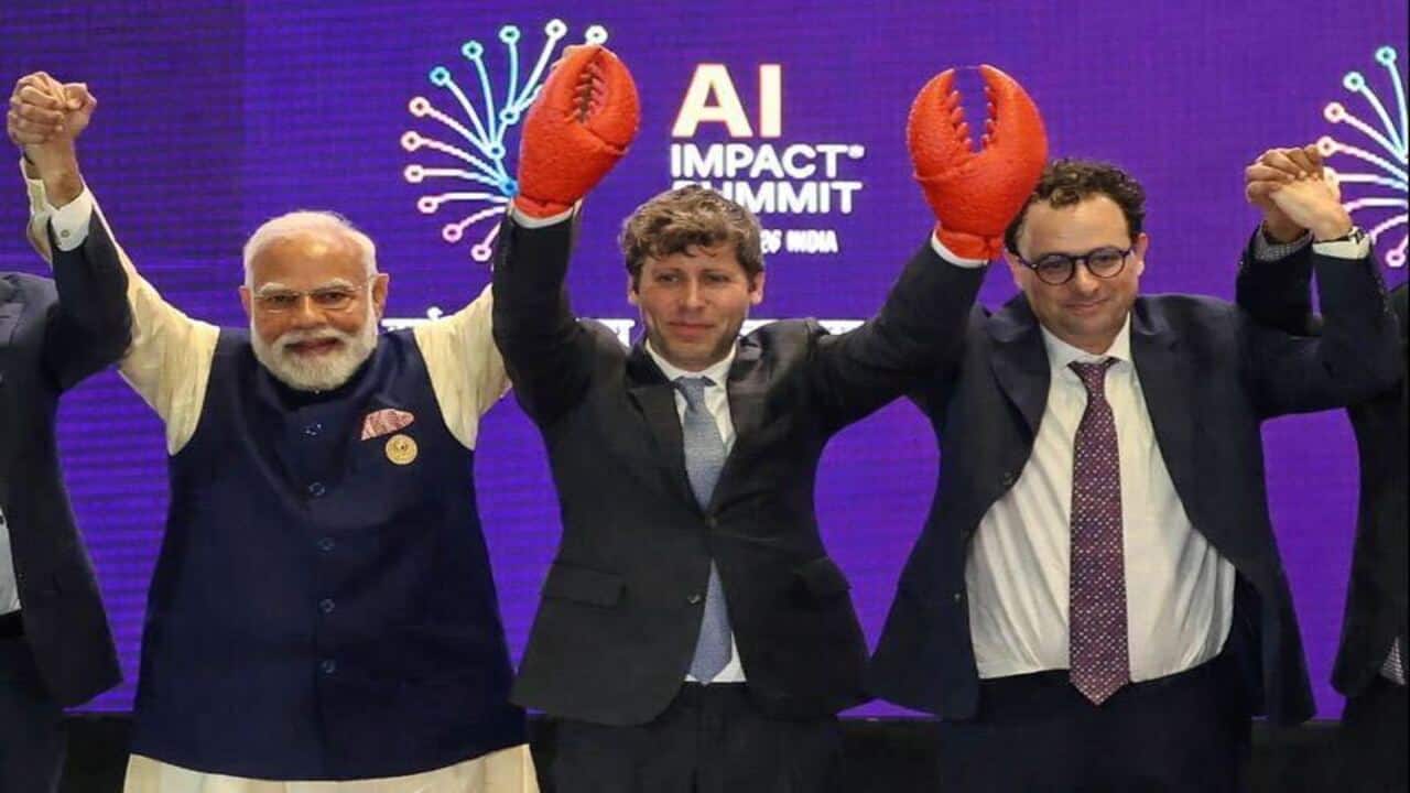 Sam Altman and Dario Amodei moment at AI summit triggers lobster claw ...