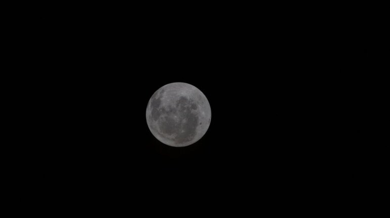 'Seen with human eyes': NASA shares first-ever image of Moon’s ...