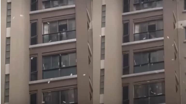 'Be careful who...': Woman throws Rs 1.5 crore cash from high-rise ...