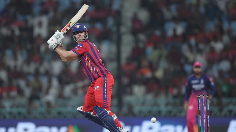 Ton-up Mitchell Marsh powers LSG to 209-3 against RCB in rain-hit IPL clash