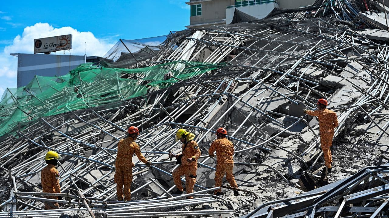 At least one dead in Philippine building collapse, 21 people missing