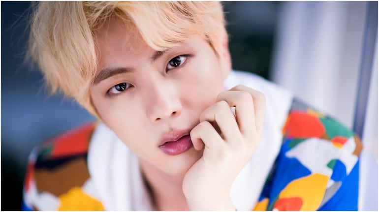 BTS' Jin opens up about delaying military enlistment; members land ...