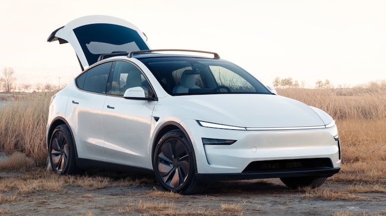 Tesla lowers Model Y entry price by Rs 9 lakh, rejigs India line-up ...