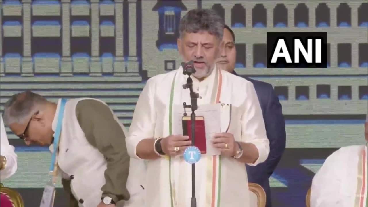 With Constitution in hand, DK Shivakumar takes oath as Karnataka CM ...