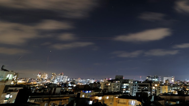 Iran and Israel exchange fire again, but Trump says nuclear deal ...