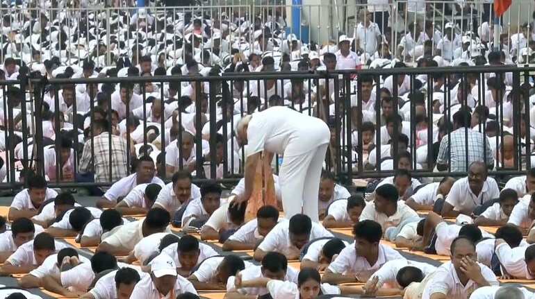 At Kolkata Yoga Day event, PM Modi steps in to help participants ...